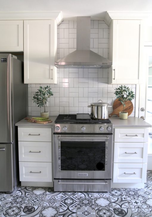 Bold Patterned Floor Tiles in an Open Floorplan Kitchen - The Decorologist